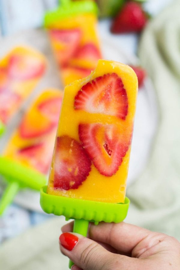Healthy Strawberry Mango Popsicles - The Clean Eating Couple