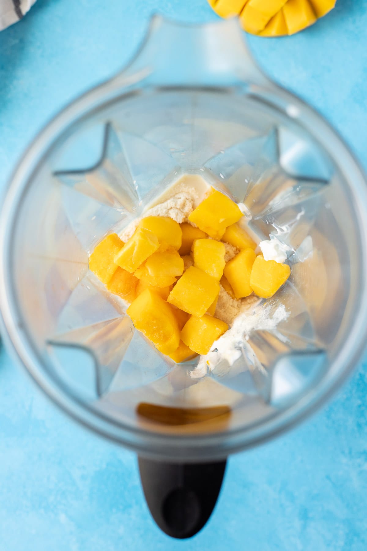 Easy Healthy Mango Protein Smoothie - The Clean Eating Couple